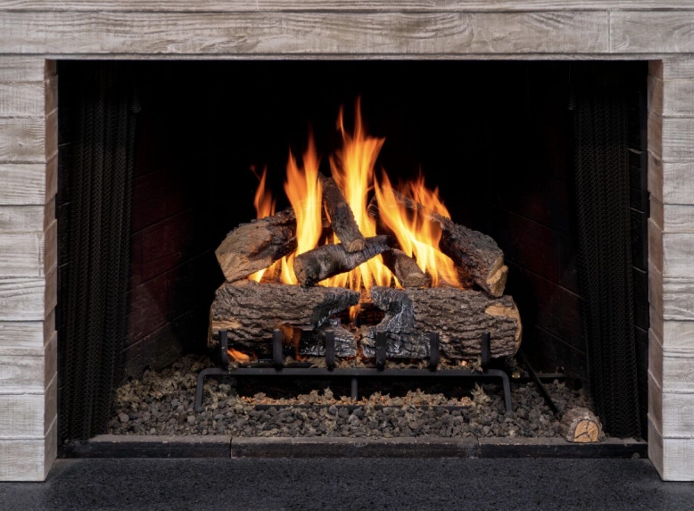Snuggling ️ By White Mountain Hearth Gas Logs! - The Hearth and Grill Shop